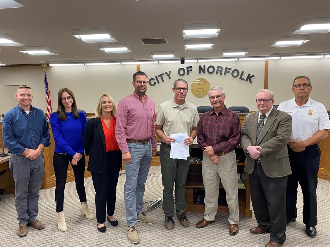 Family of former Norfolk resident presents $250K check to city ...